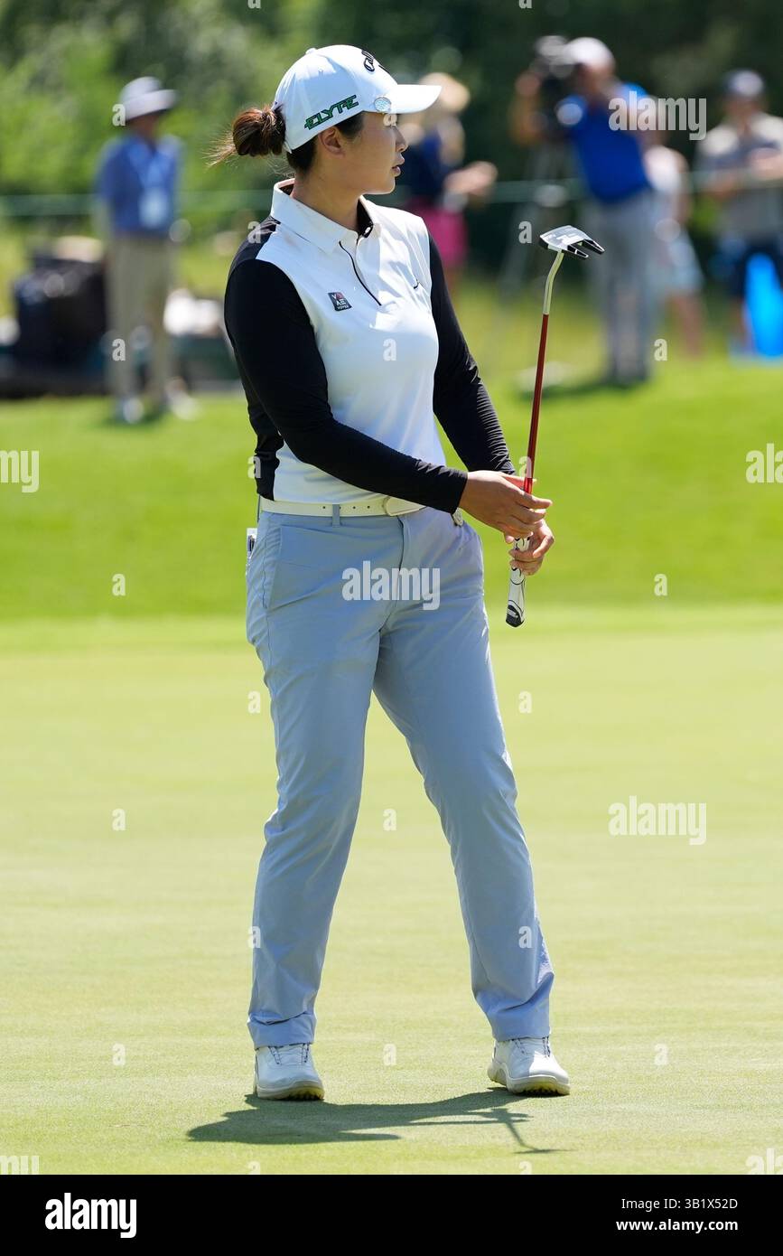 Yan Liu, of China, watches her putt on the second green during the third round of the Chevron ...