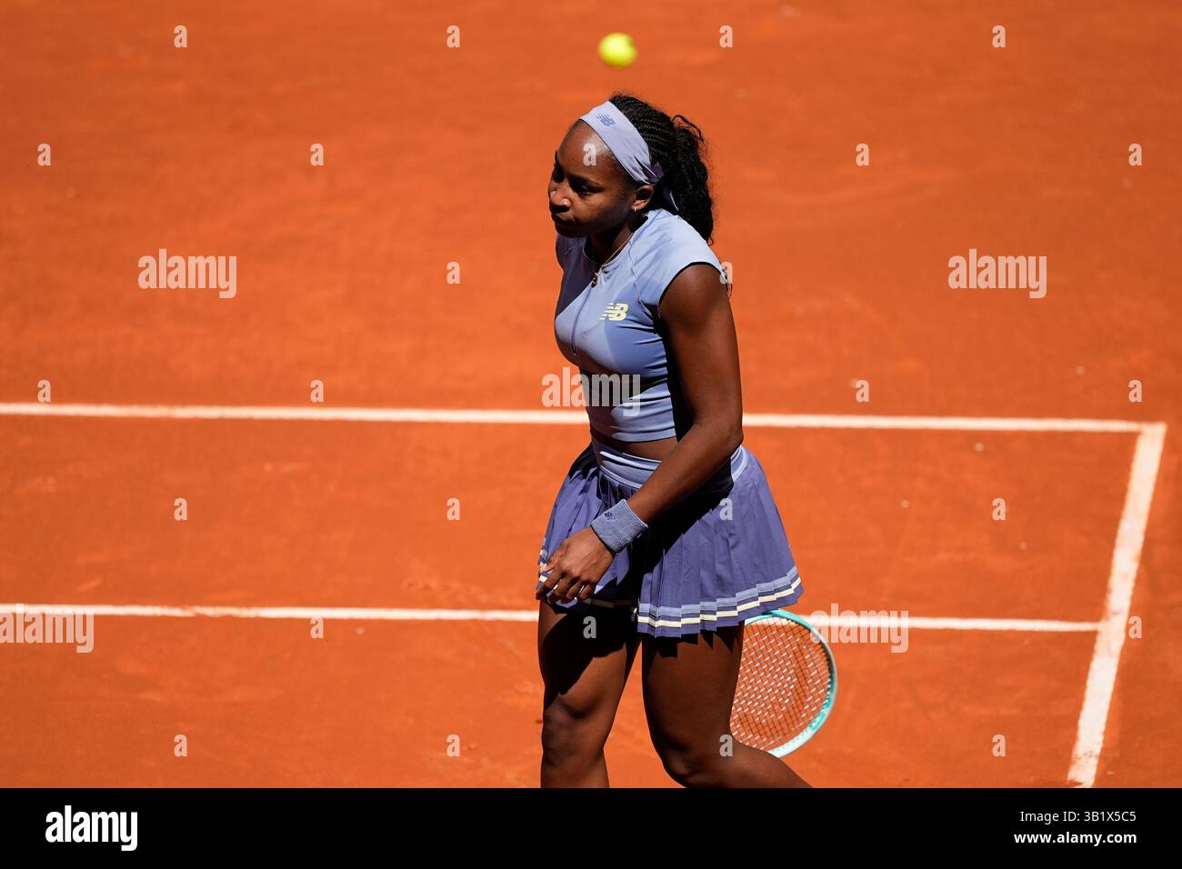 Coco Gauff of USA looks down against Ann Li of USA during the Mutua ...