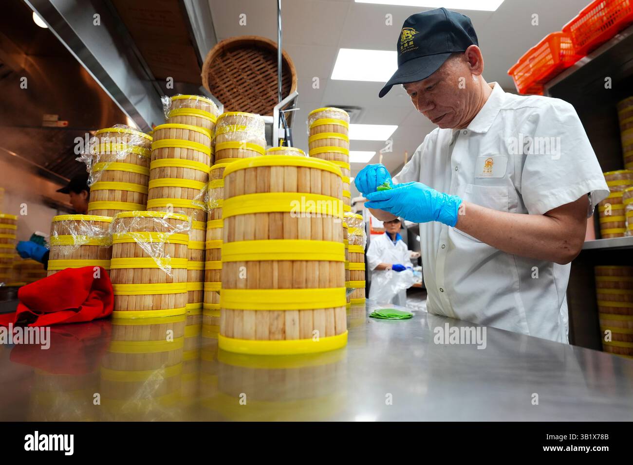 Markham, Canada. 26th Apr, 2025. Wai Hung Kwok makes dumplings at the ...