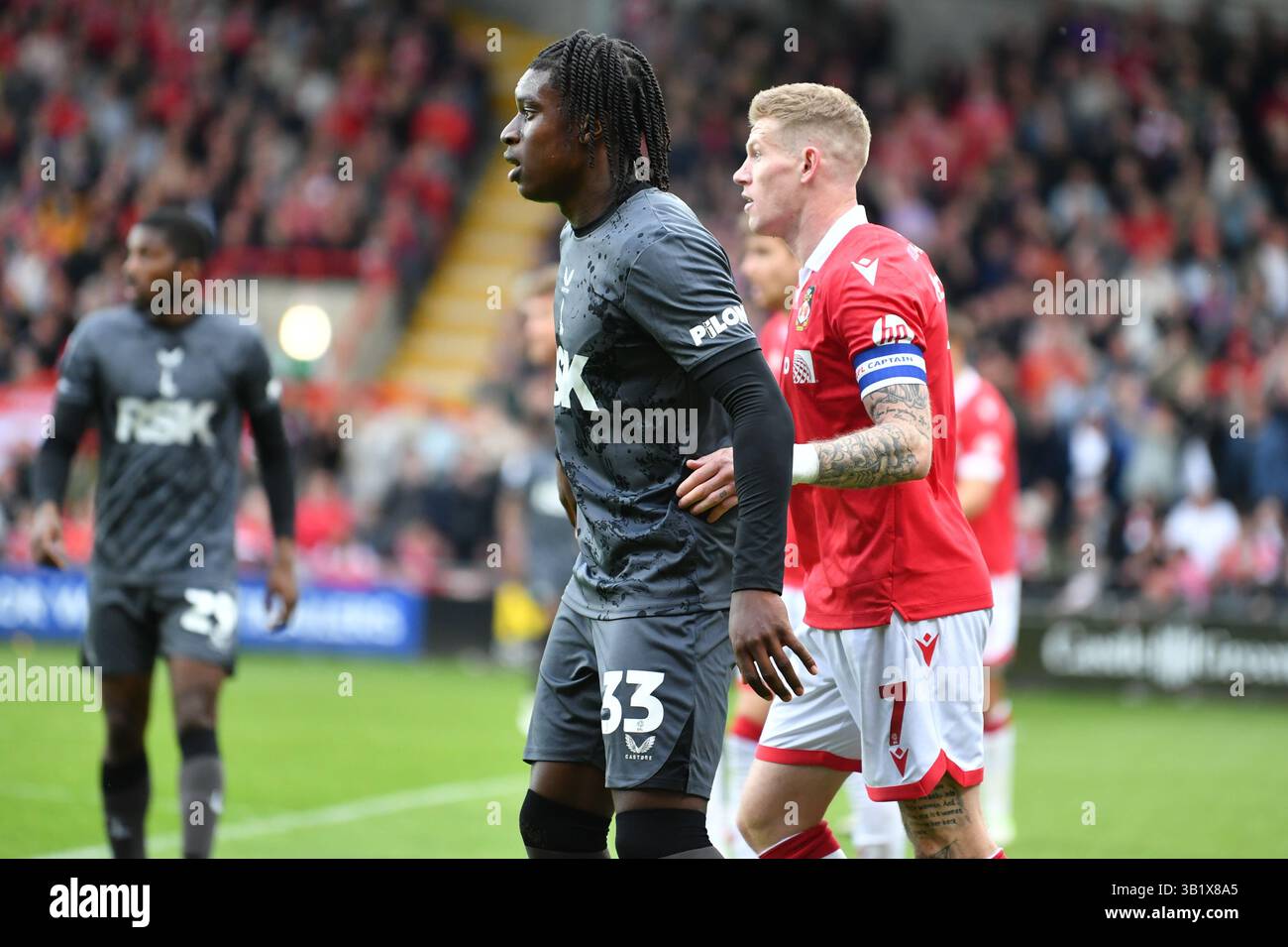 Wrexham, UK. 26th Apr 2025. Micah Mbick and James McClean during the ...