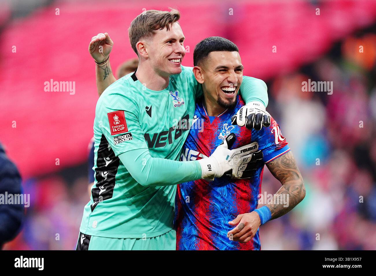 Crystal Palace goalkeeper Dean Henderson (left) and Daniel Munoz ...