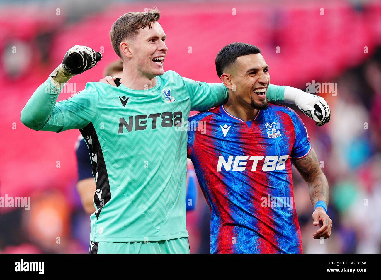Crystal Palace goalkeeper Dean Henderson (left) and Daniel Munoz ...