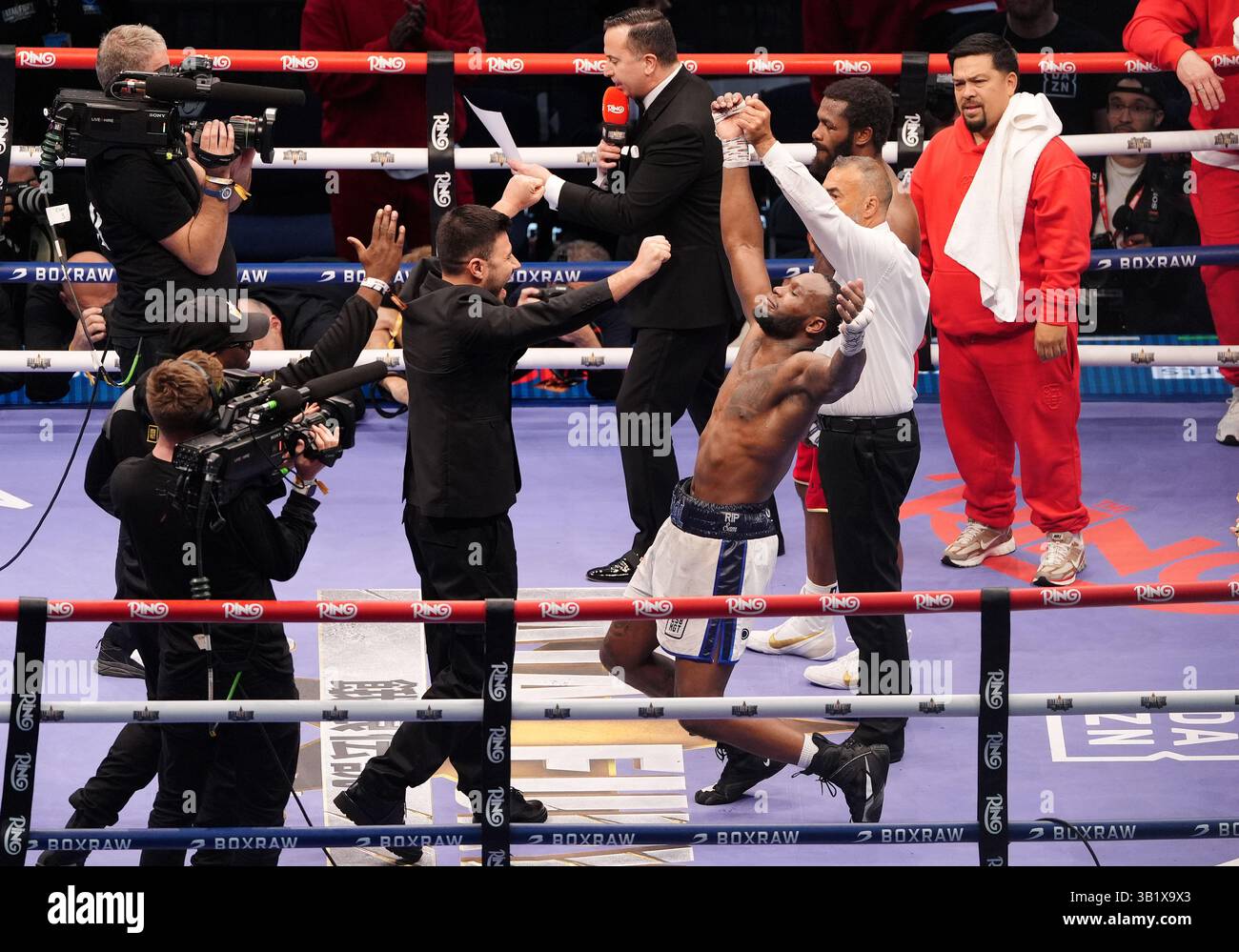 Viddal Riley celebrates winning their cruiserweight bout against ...