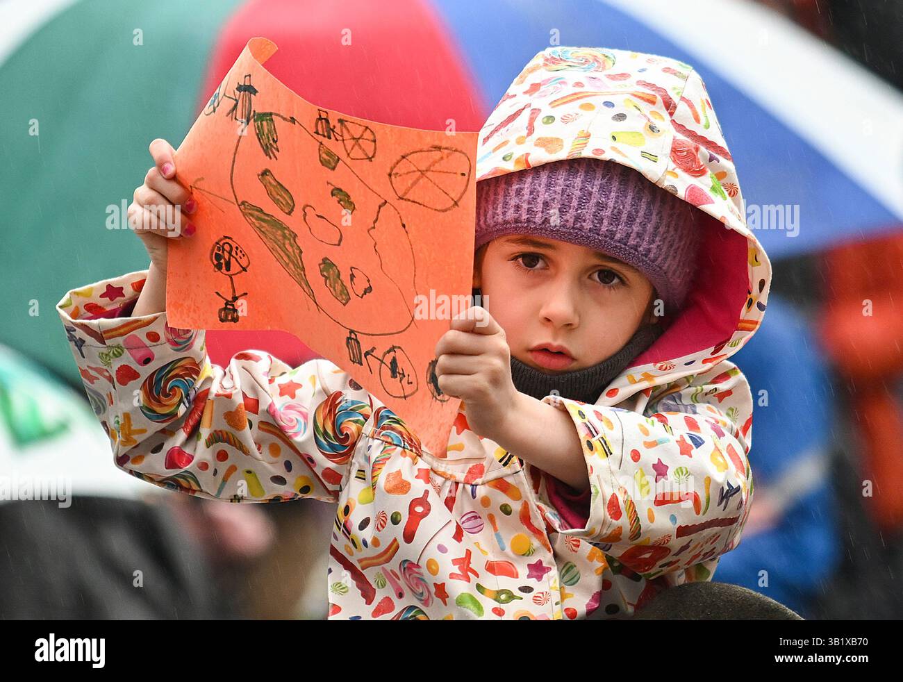 A child takes part in an Earth Day rally in Montreal, Saturday, April ...