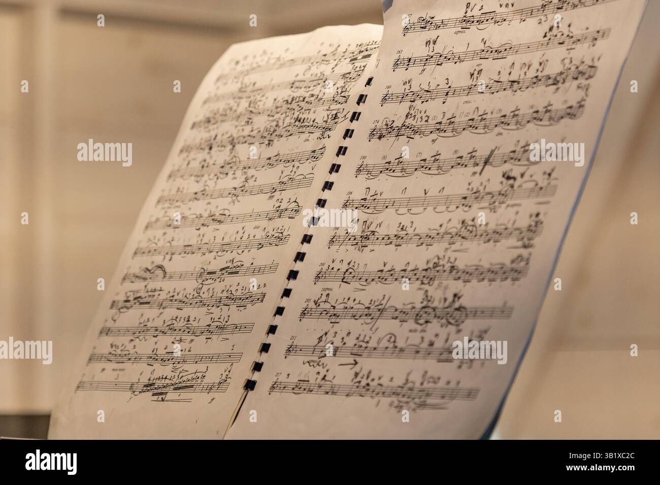 Vintage sheet music on a stand with neutral background Stock Photo - Alamy