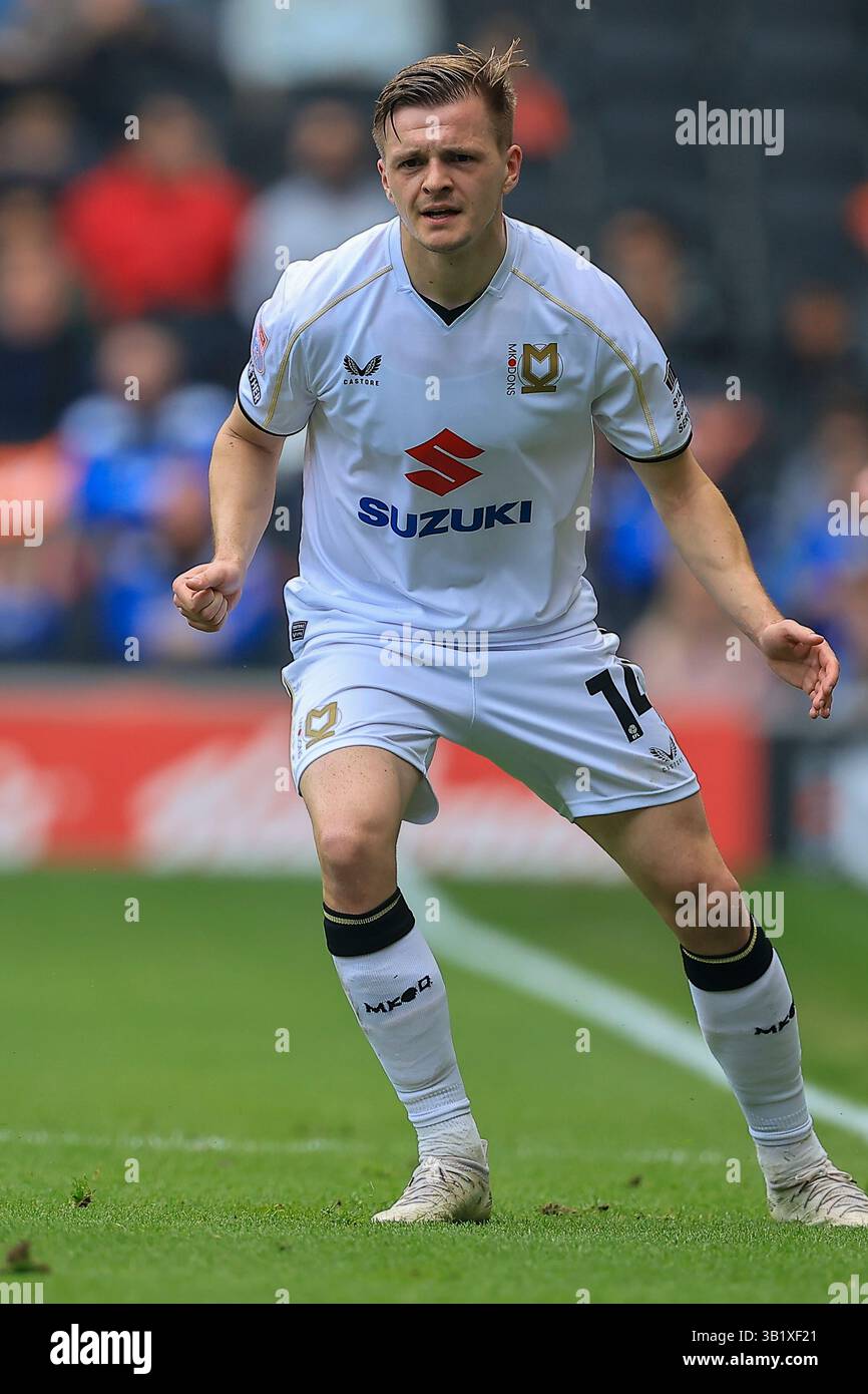 Milton Keynes Dons Defender Joe Tomlinson (14) during the EFL League 2 ...