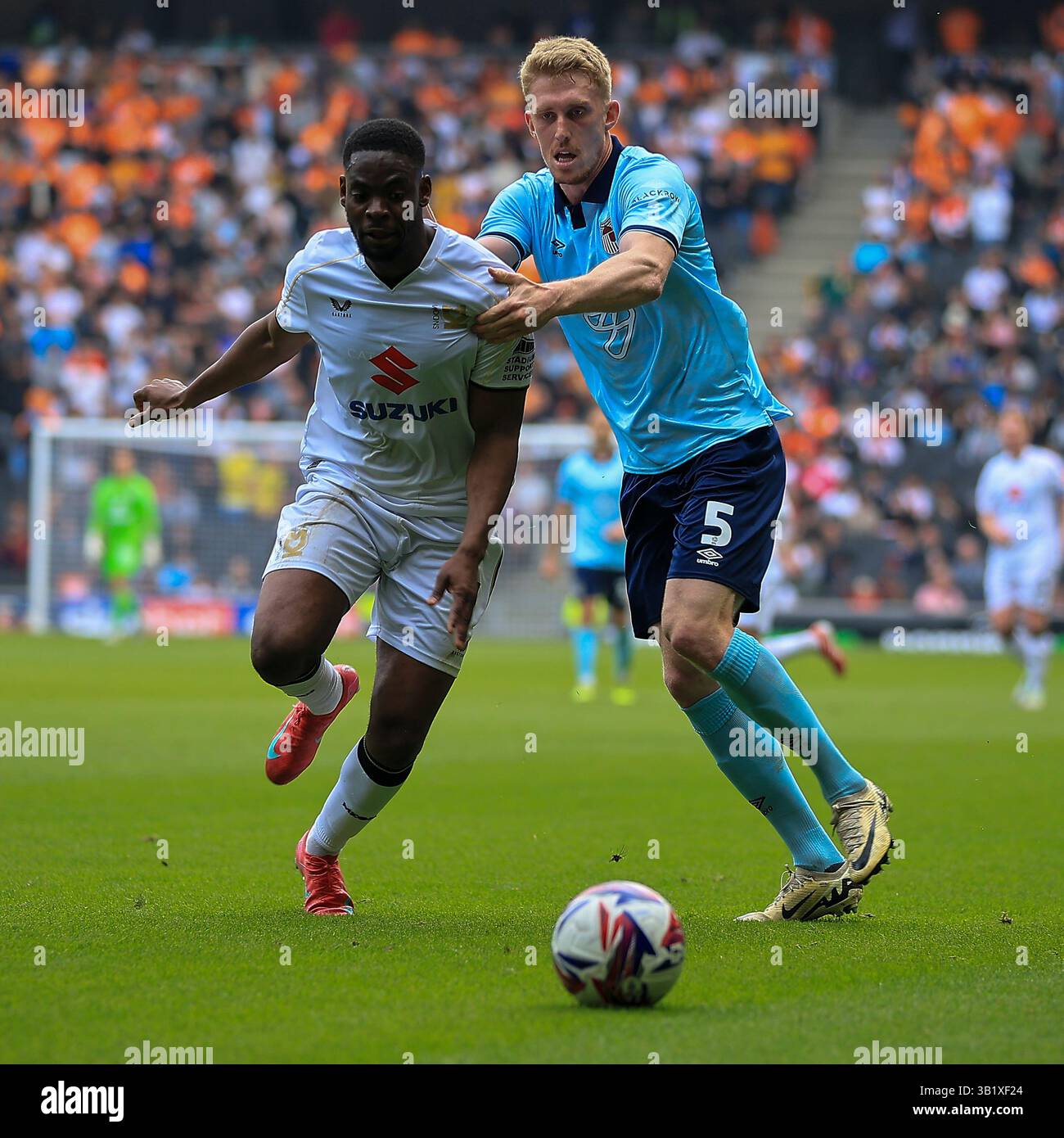 Milton Keynes Dons Forward Jonathan Leko (7) Under Pressure from ...