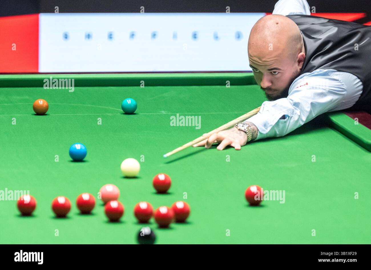 Luca Brecel during his match against Ding Junhui, on day eight of the ...