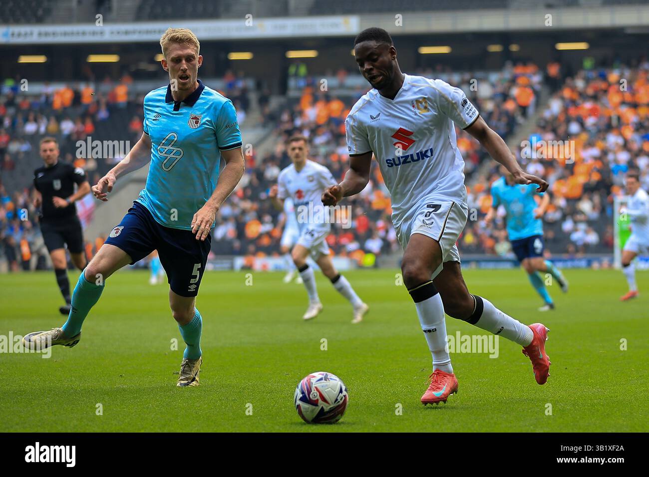 Milton Keynes Dons Forward Jonathan Leko (7) Under Pressure from ...