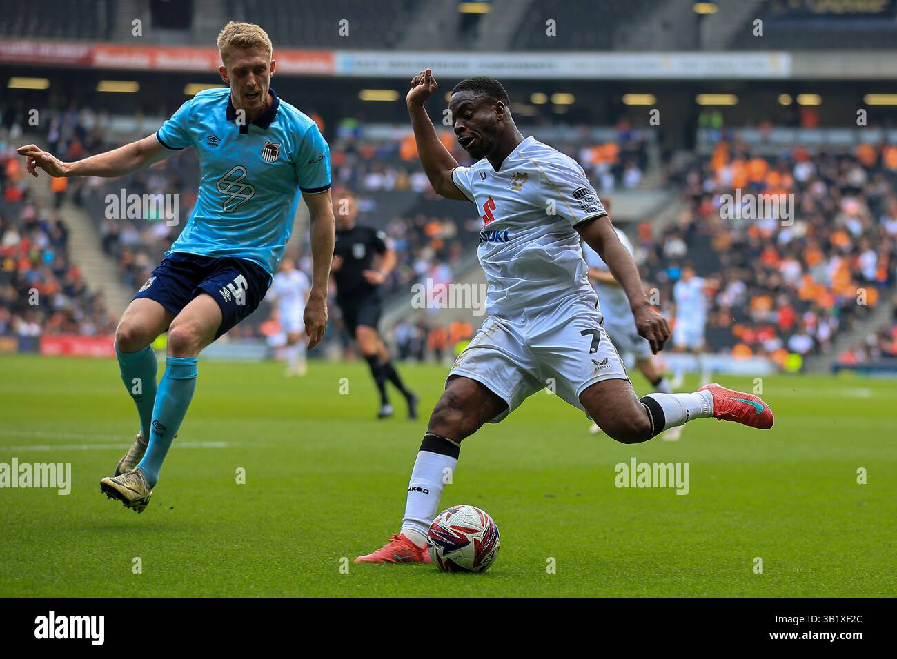 Milton Keynes Dons Forward Jonathan Leko (7) Under Pressure from ...