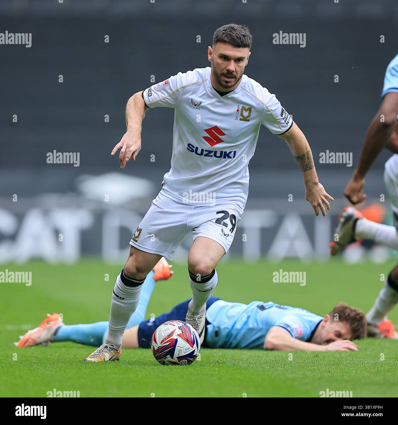 Milton Keynes Dons Forward Scott Hogan (29) during the EFL League 2 ...