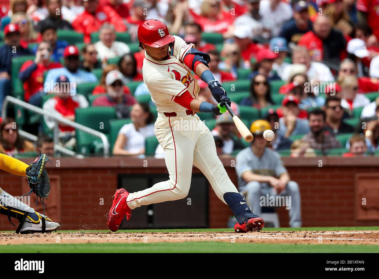 St. Louis Cardinals' Masyn Winn hits a double during the third inning ...