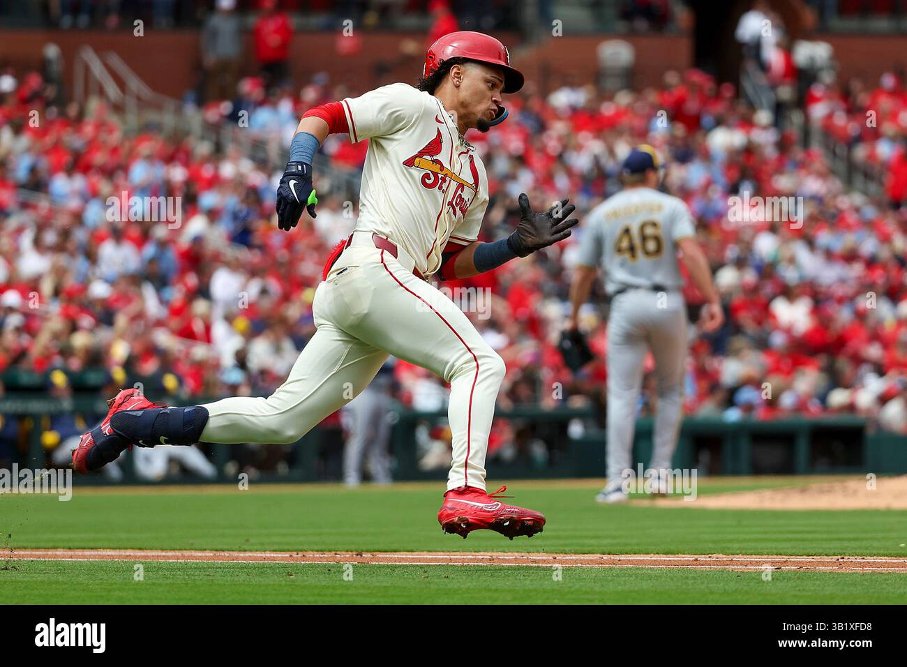 St. Louis Cardinals' Masyn Winn runs to second base for a double during ...