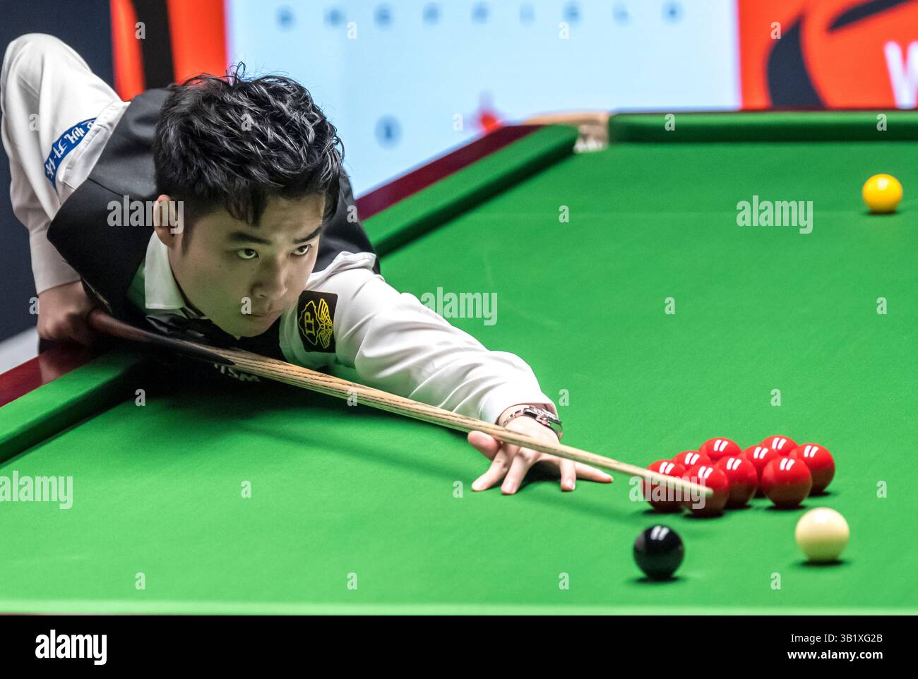 Si Jiahui during his match against Ben Woollaston, on day eight of the ...