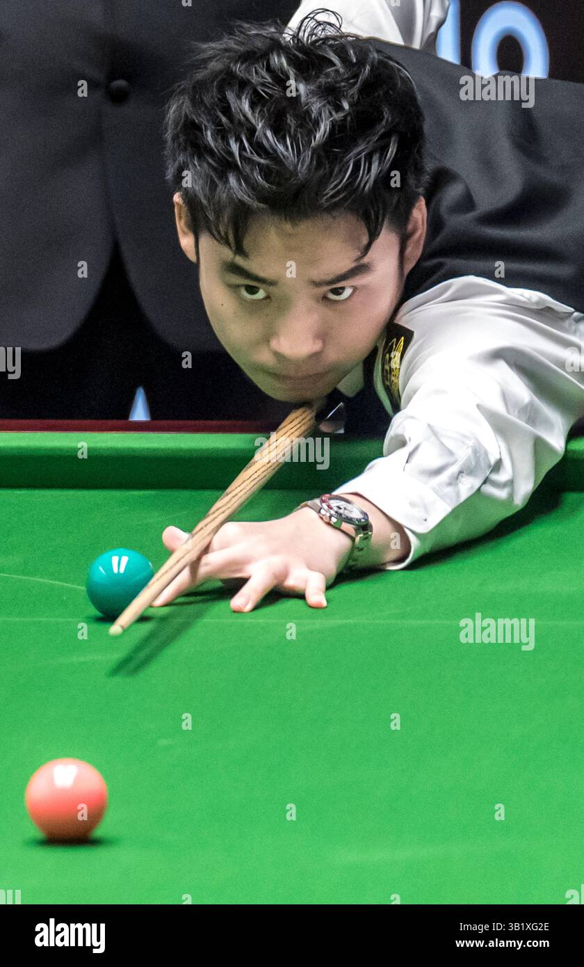 Si Jiahui during his match against Ben Woollaston, on day eight of the ...