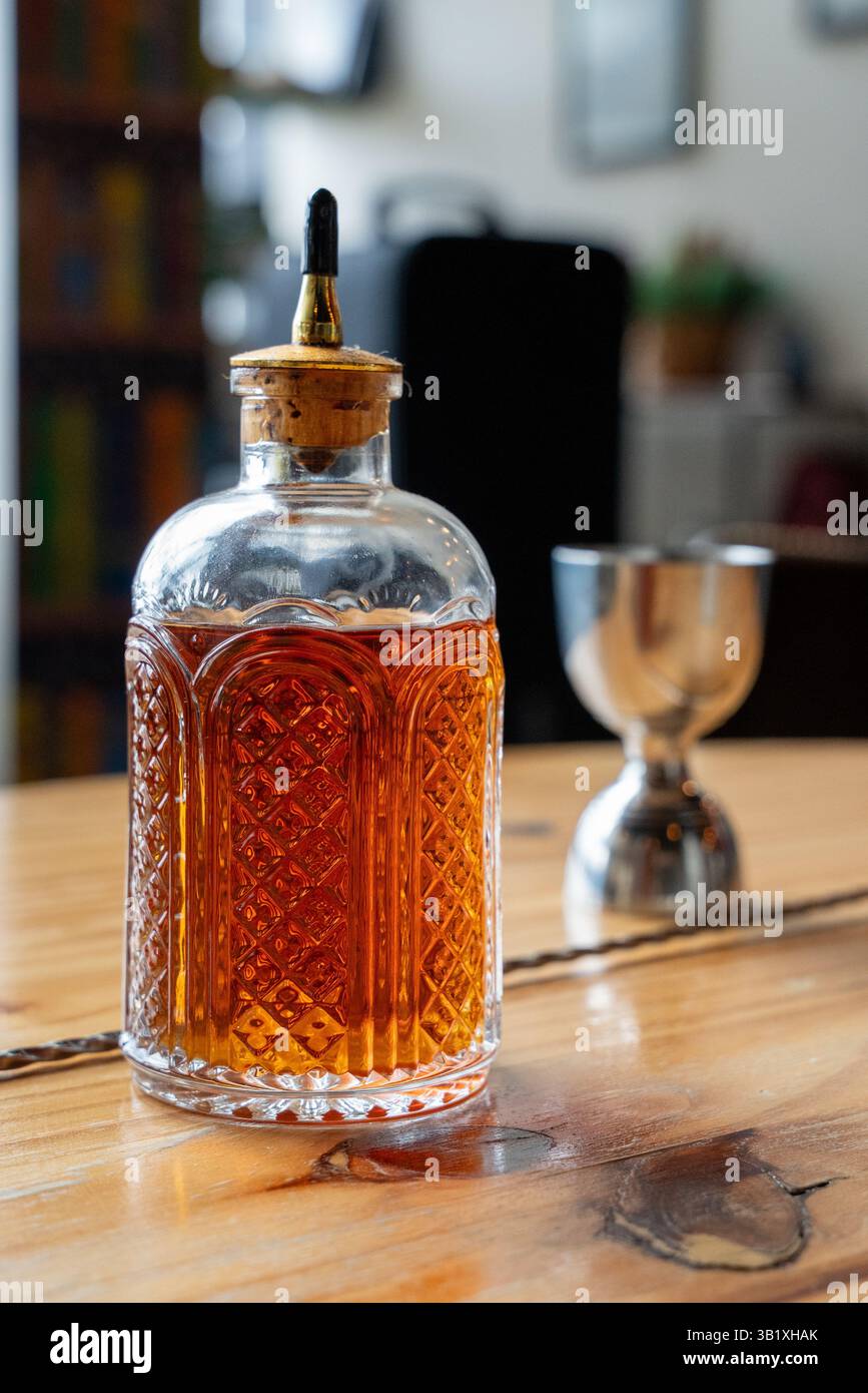 Ornate Bitters Bottle at High-End Cocktail Bar Stock Photo - Alamy