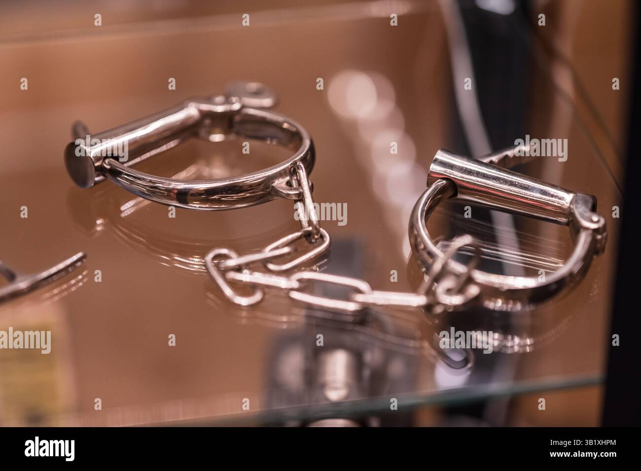 Vintage hand cuffs hi-res stock photography and images - Alamy