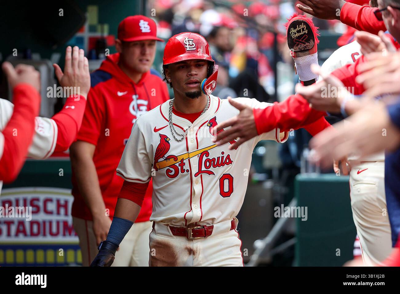 St. Louis Cardinals' Masyn Winn is congratulated by teammates after ...