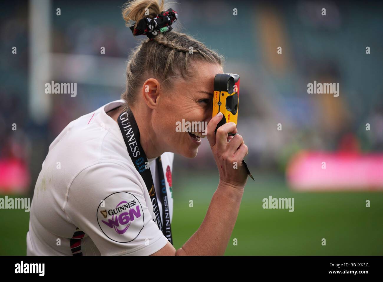 England's Natasha Hunt takes a picture after the presentation ceremony ...