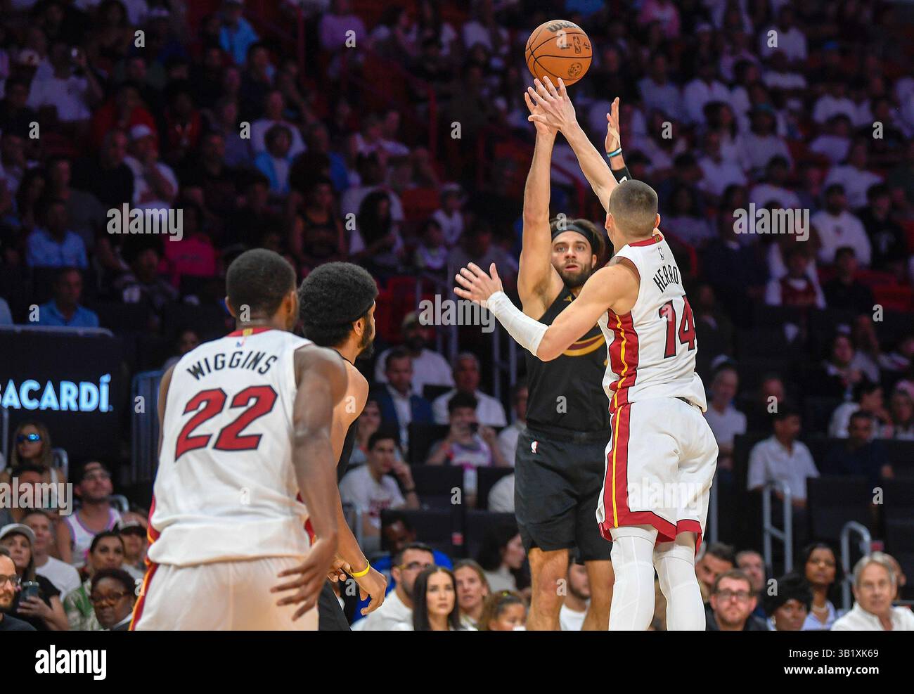 Cleveland Cavaliers guard Max Strus shoots over Miami Heat guard Tyler ...