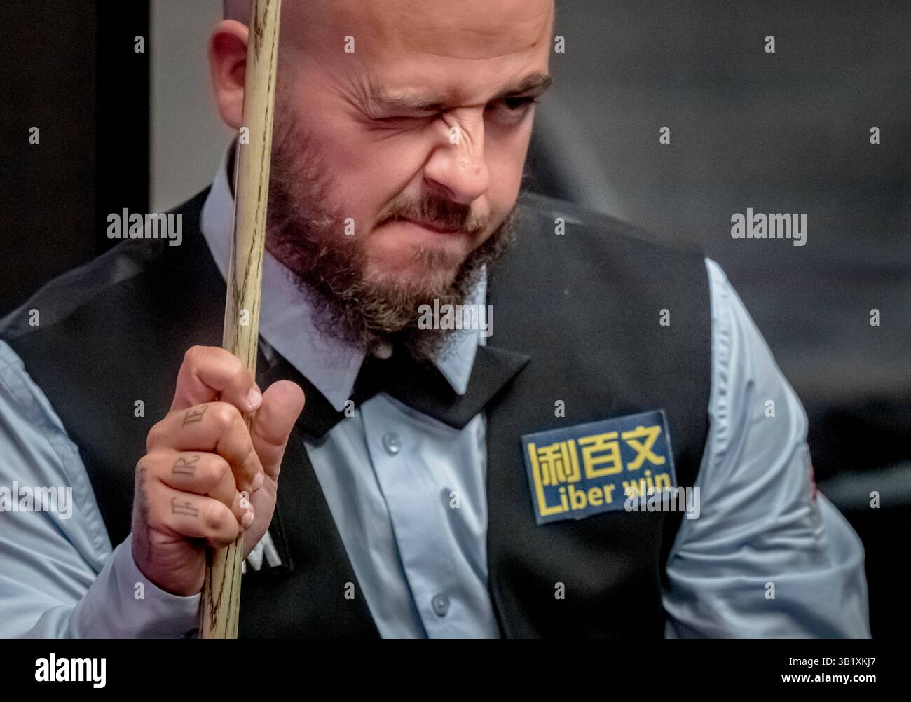 Luca Brecel during his match against Ding Junhui, on day eight of the ...