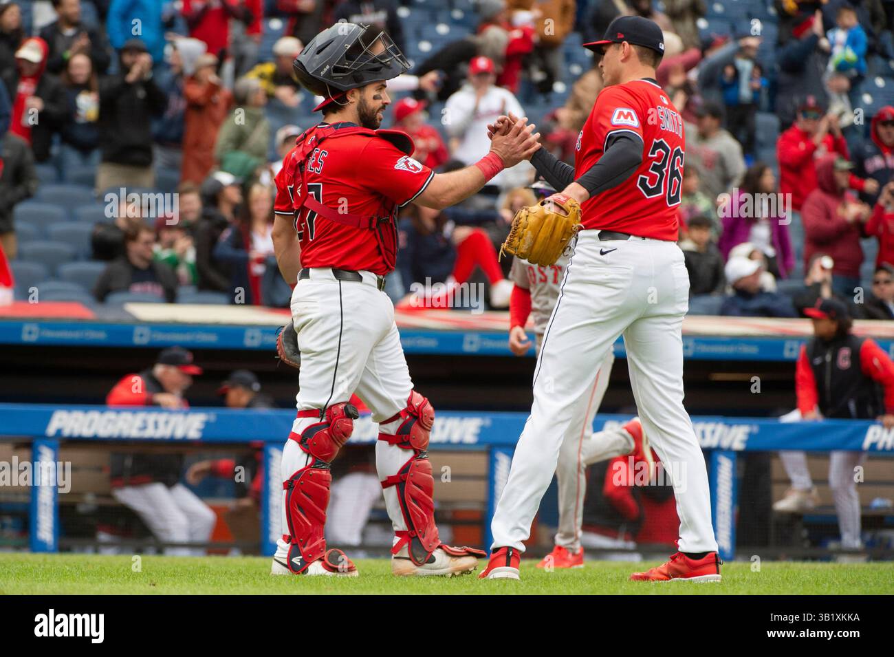 Cleveland Guardians' Austin Hedges, left congratulates relief pitcher ...