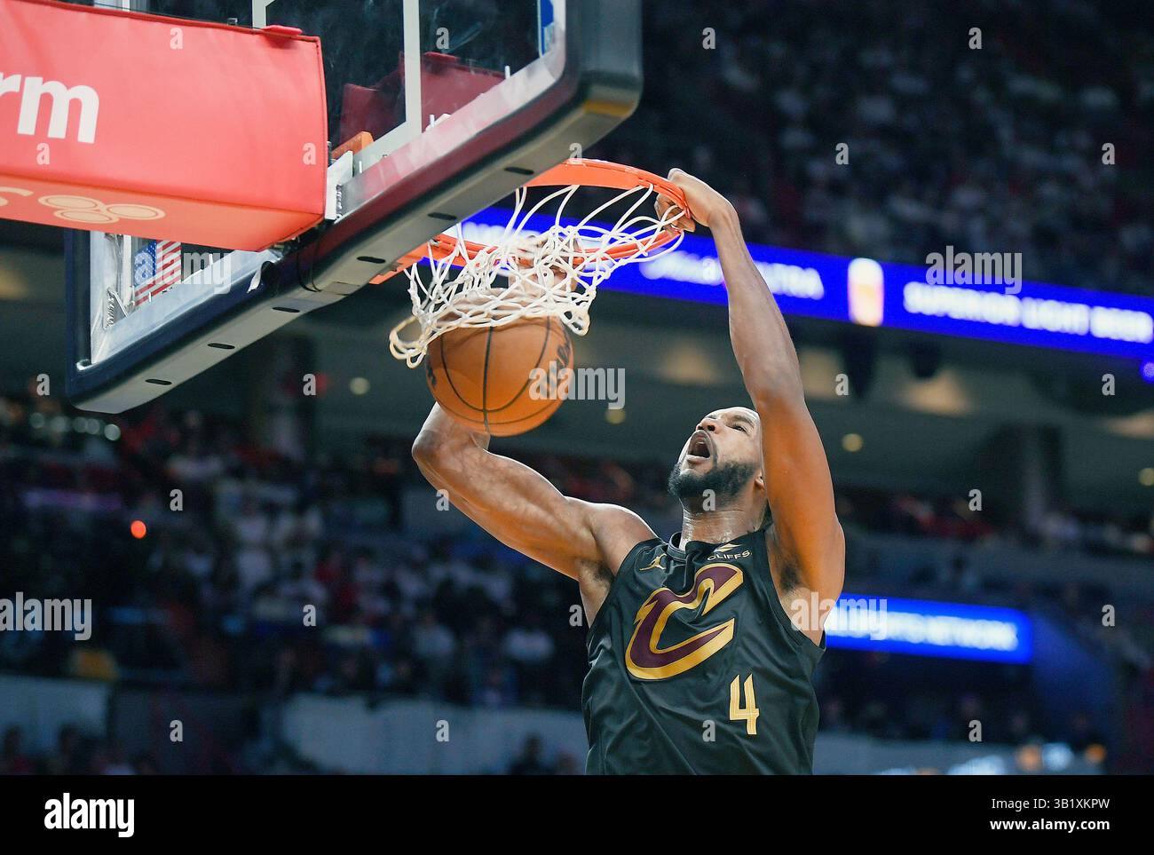 Cleveland Cavaliers forward Evan Mobley (4) scores against the Miami ...