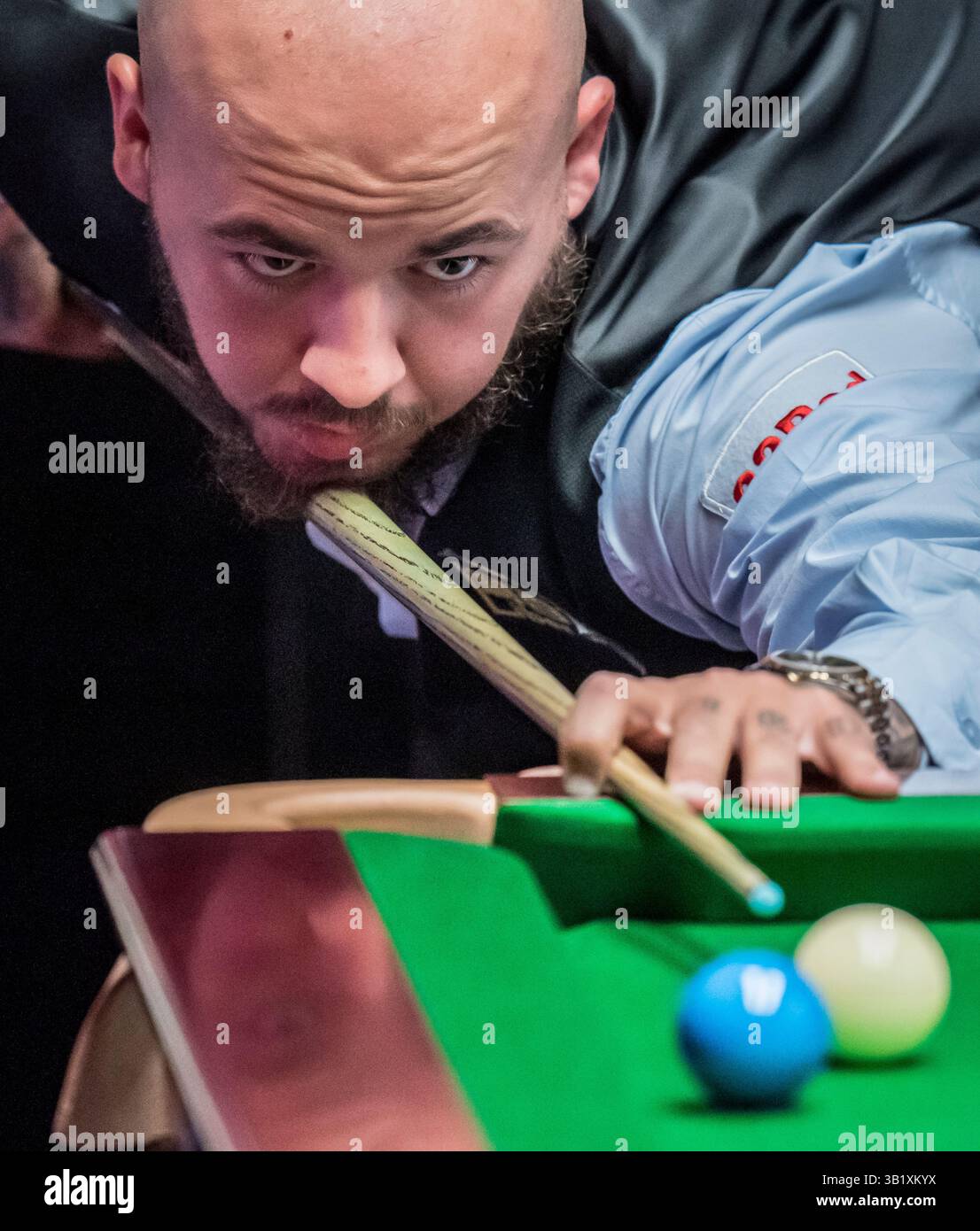 Luca Brecel during his match against Ding Junhui, on day eight of the ...
