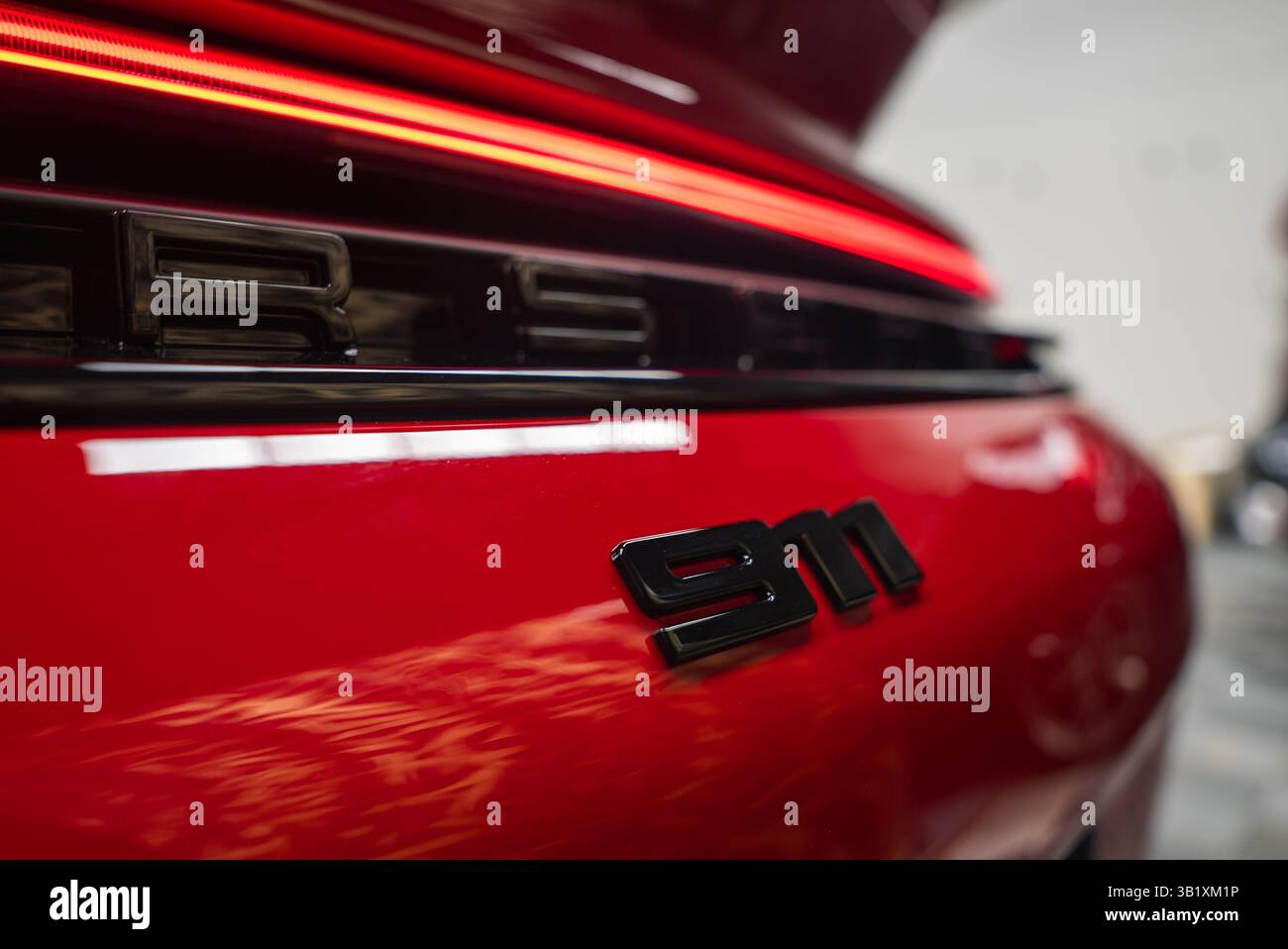 Close up view of the rear of a red 2025 Porsche 911 GT3 922, featuring ...