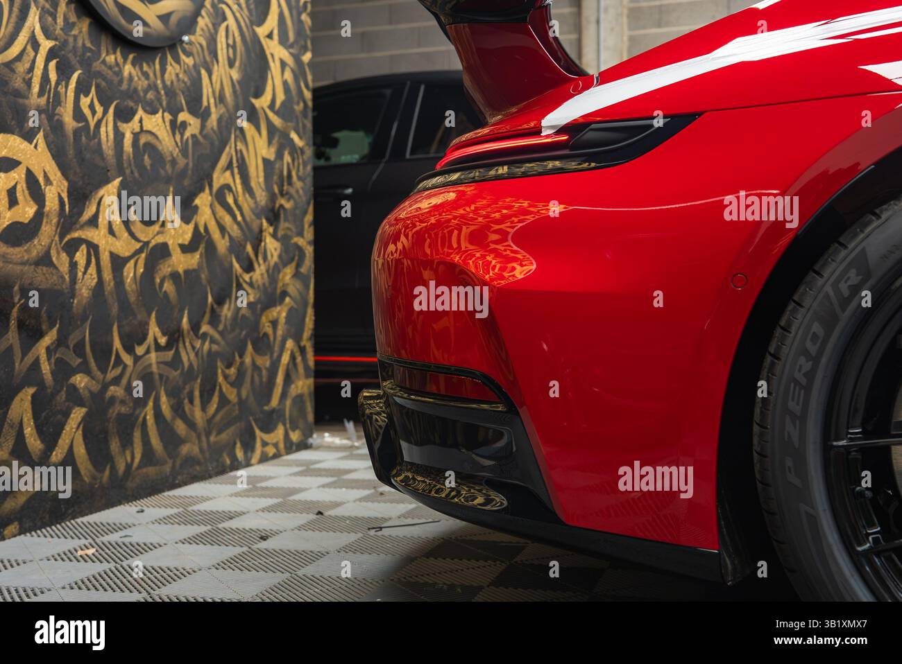 Close Up of 2025 Porsche 911 GT3 922 Rear on Checkered Floor Indoors ...