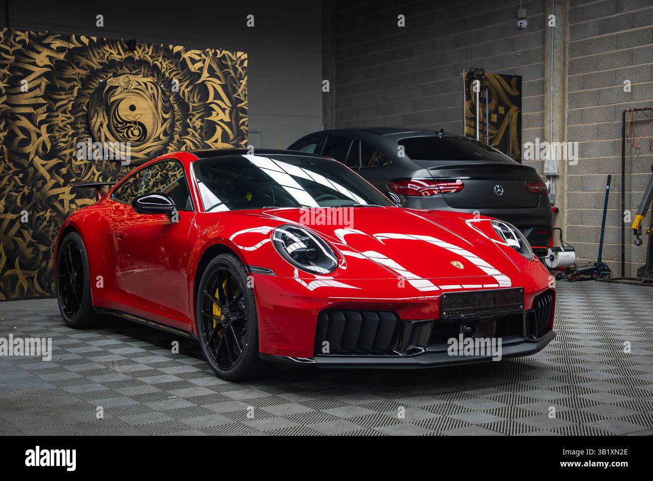 Red 2025 Porsche 911 GT3 922 with White Stripes in Modern Garage Stock ...