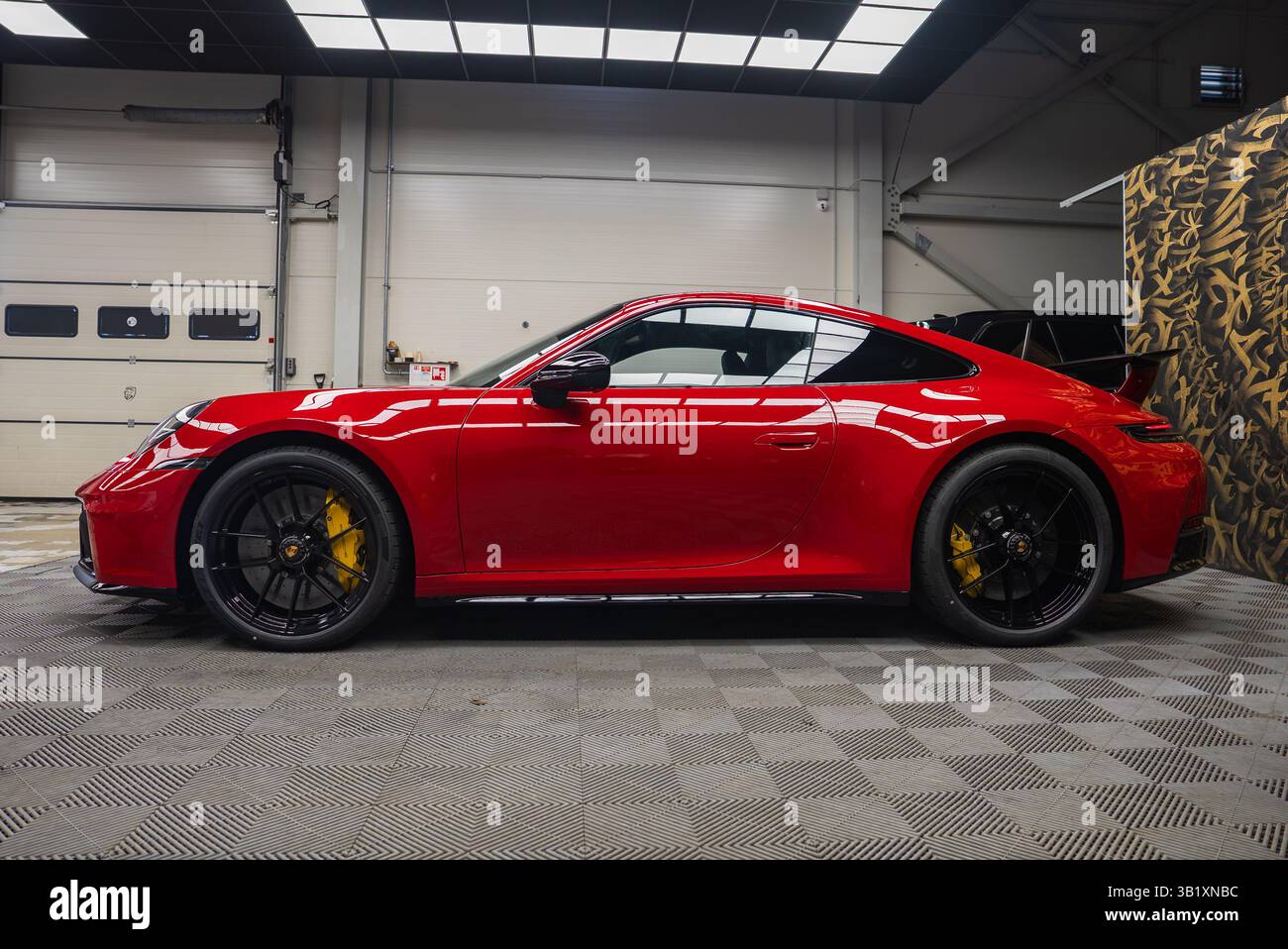 Red 2025 Porsche 911 GT3 922 in a Well Lit Indoor Showroom Stock Photo ...