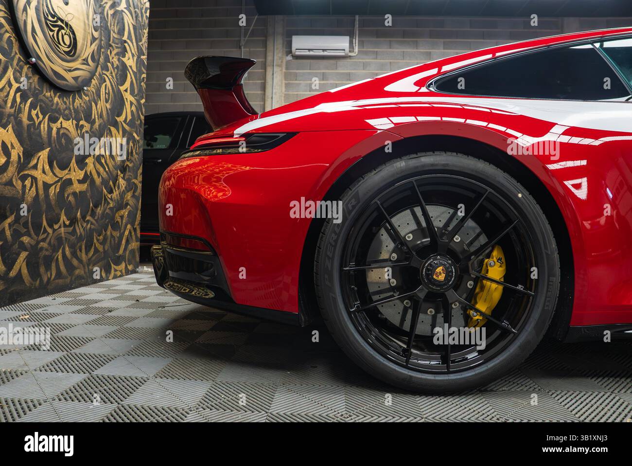 Rear View of Red 2025 Porsche 911 GT3 922 in Indoor Setting Stock Photo ...