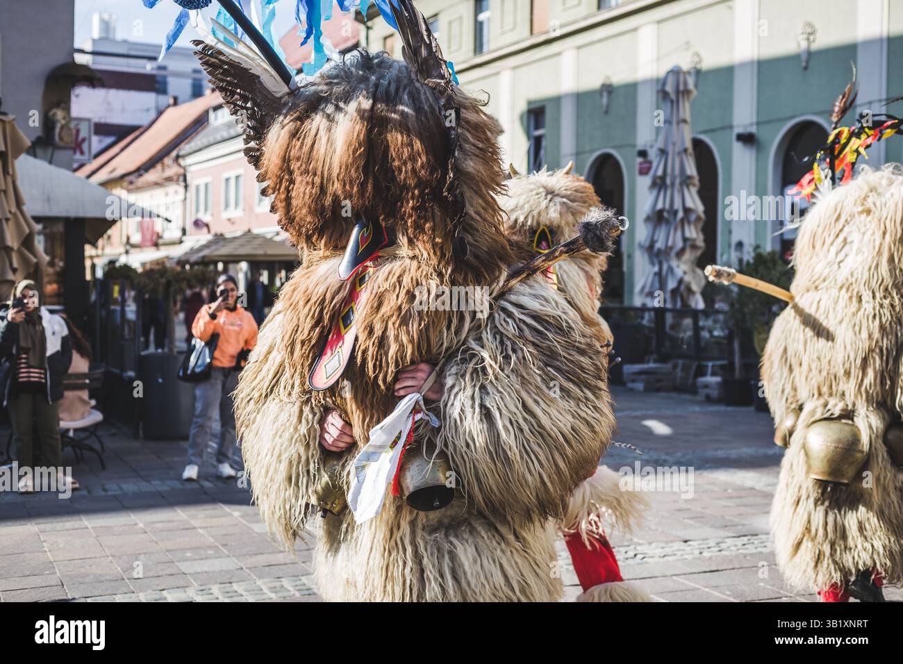A kurent without his mask on carnival in Slovenia. It's a traditional ...