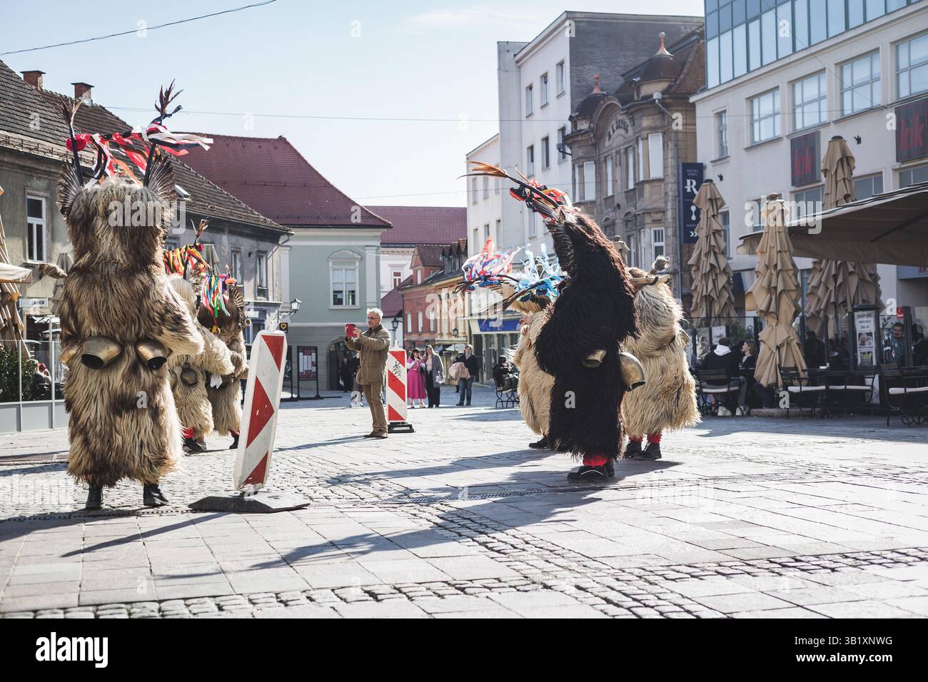 A kurent without his mask on carnival in Slovenia. It's a traditional ...