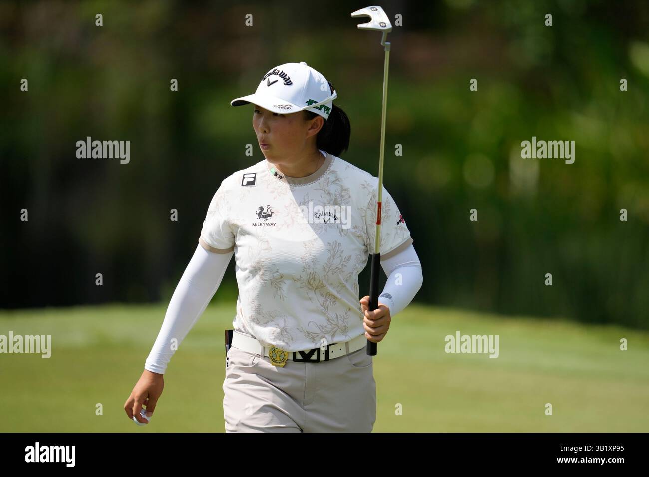 Ruoning Yin, of China, walks on the 17th green during the third round ...