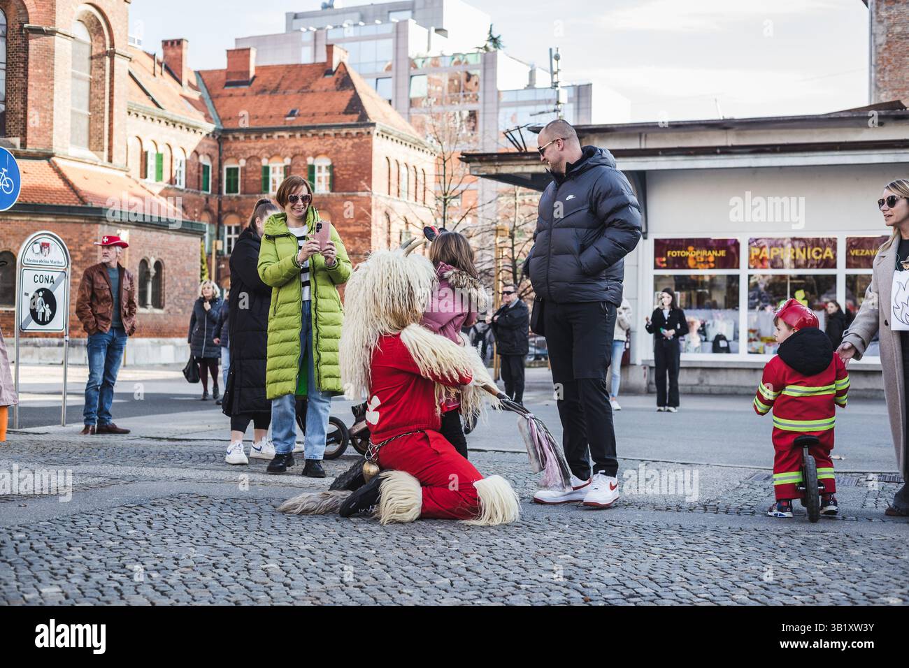 A kurent without his mask on carnival in Slovenia. It's a traditional ...