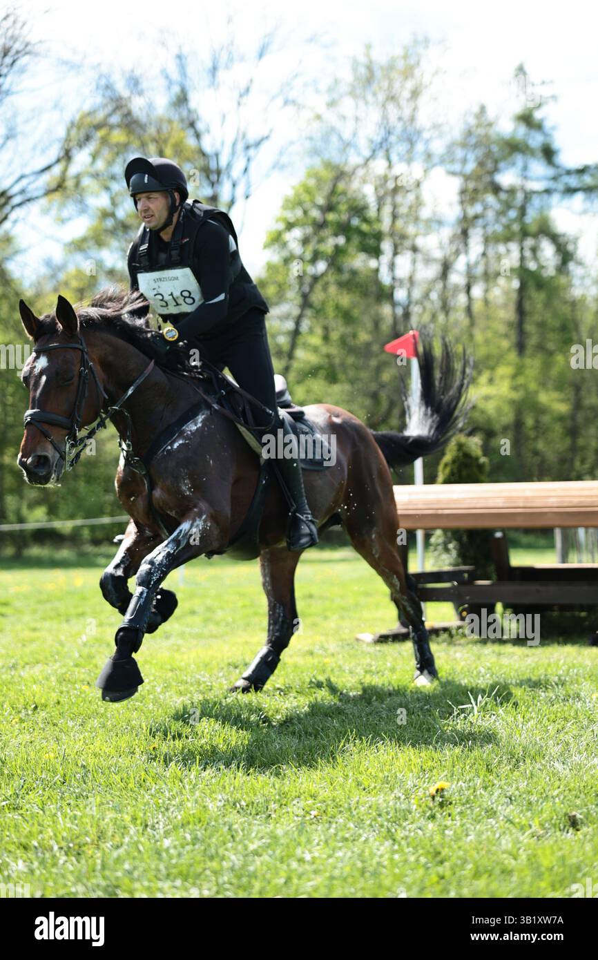 Sergii Chernykh of Ukraine with Issac PKZ during the CCI4*-S cross ...