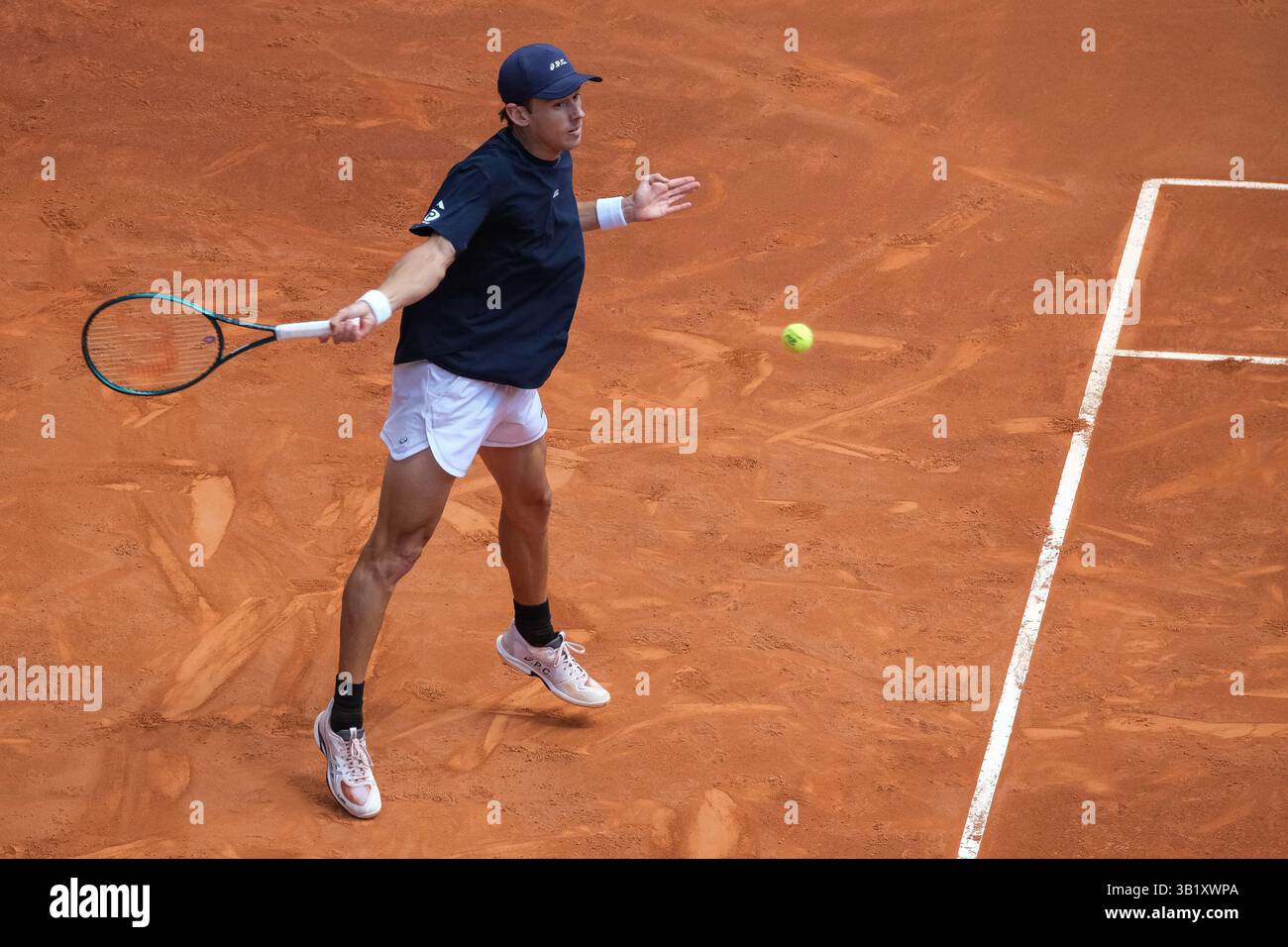 Alex de Minaur of Australia in action against Lorenzo Sonego the Mutua ...