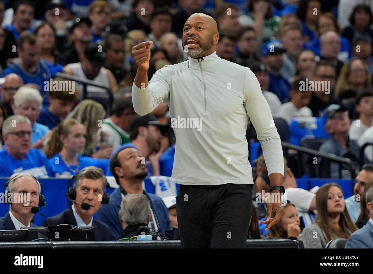 Orlando Magic head coach Jamahl Mosley directs his players against the ...