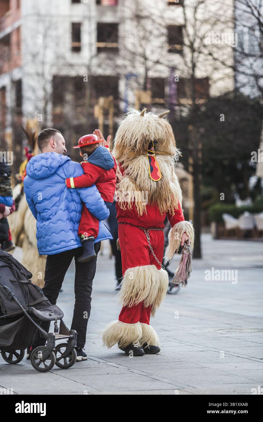 A kurent without his mask on carnival in Slovenia. It's a traditional ...