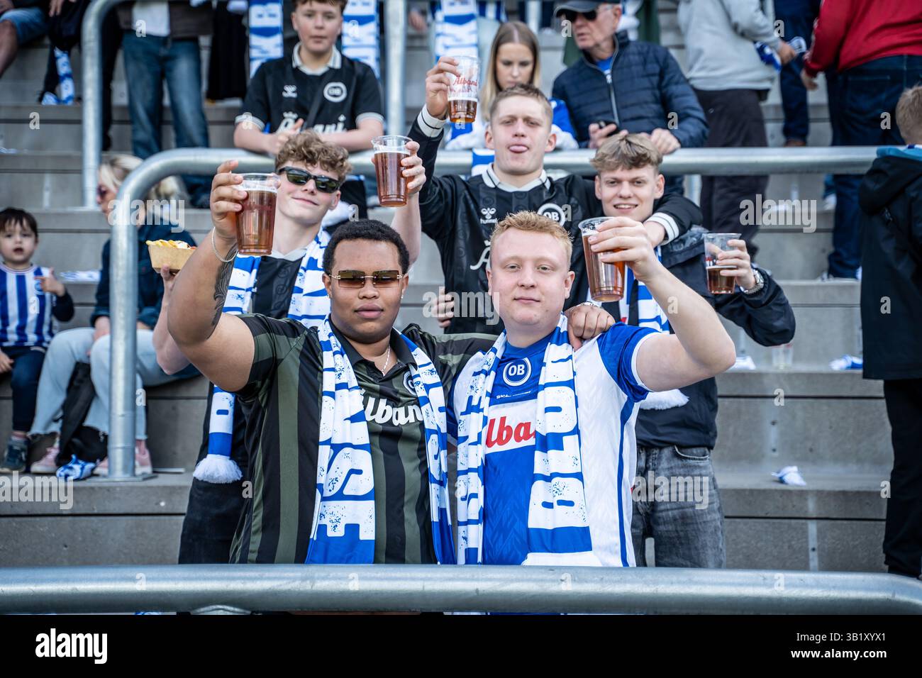 Odense, Denmark. , . Football fans of Odense BK seen on the stands ...
