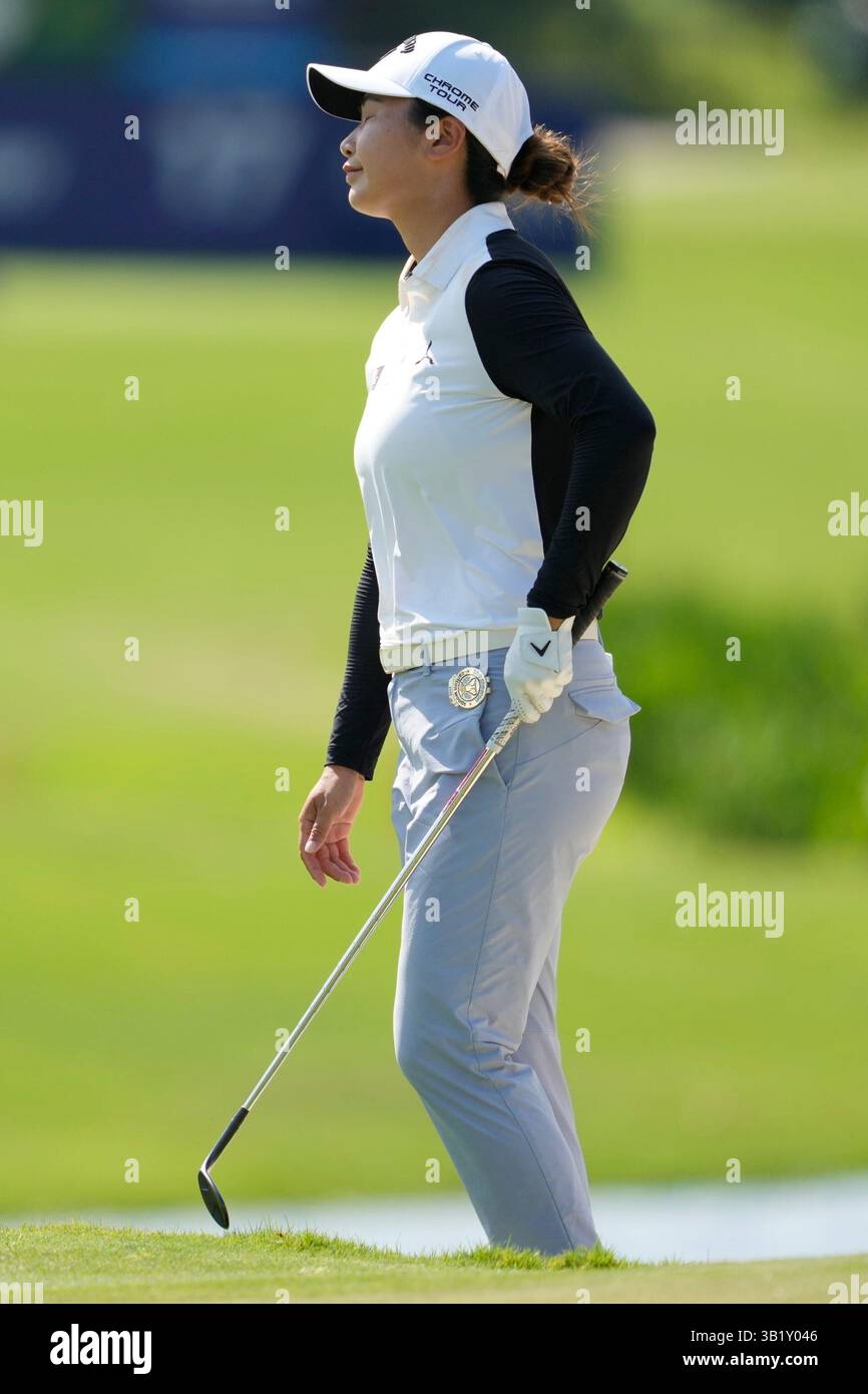 Yan Liu, of China, reacts to her play on the 17th green during the third round of the Chevron ...
