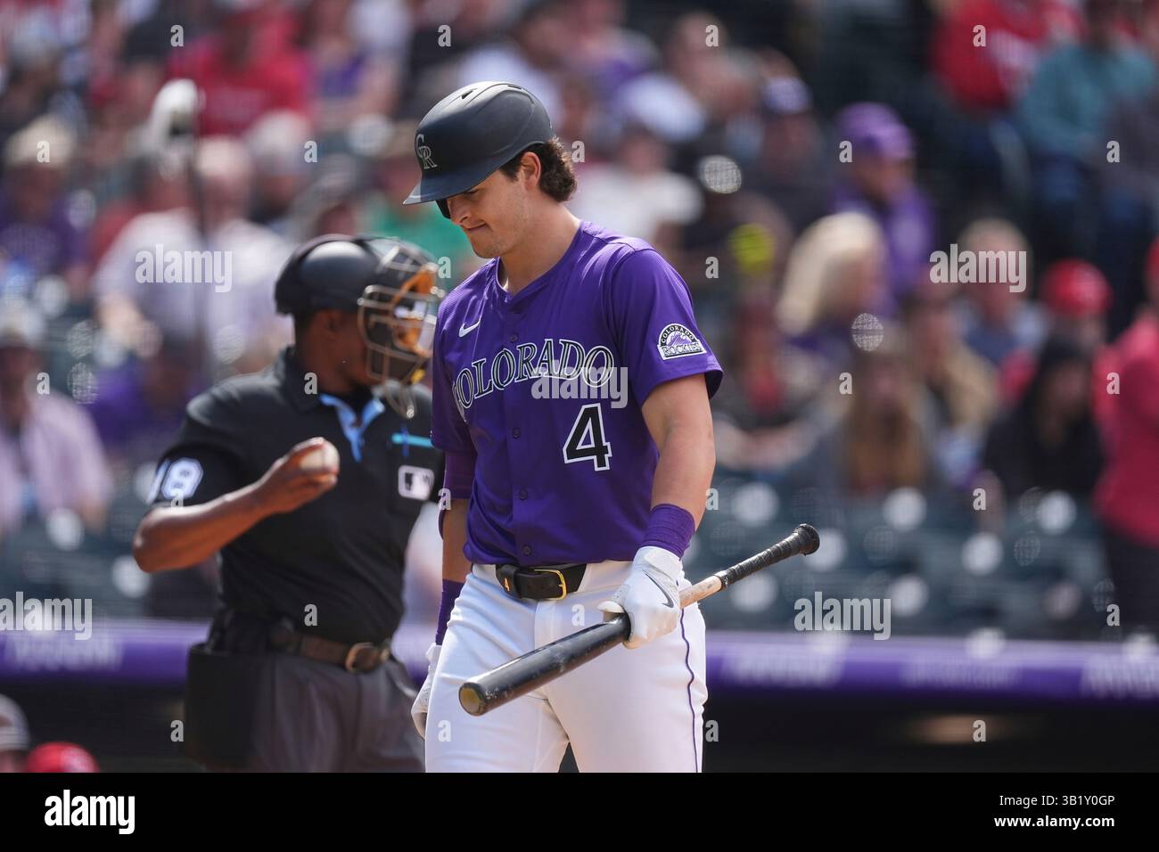Colorado Rockies' Michael Toglia reacts after striking out against ...