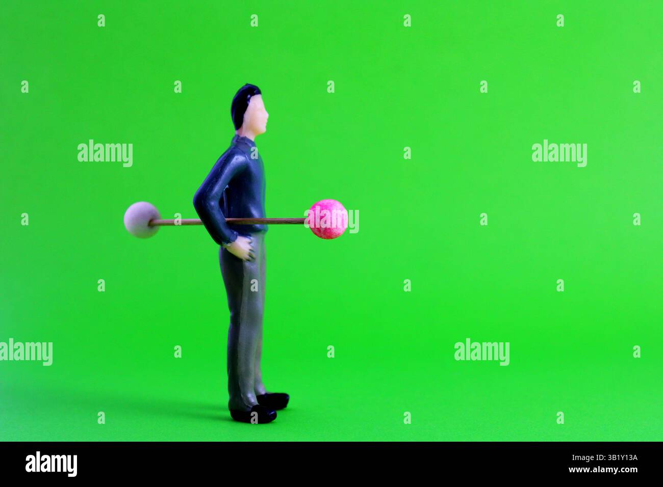 Executive holding a bar with colorful spheres representing the status ...