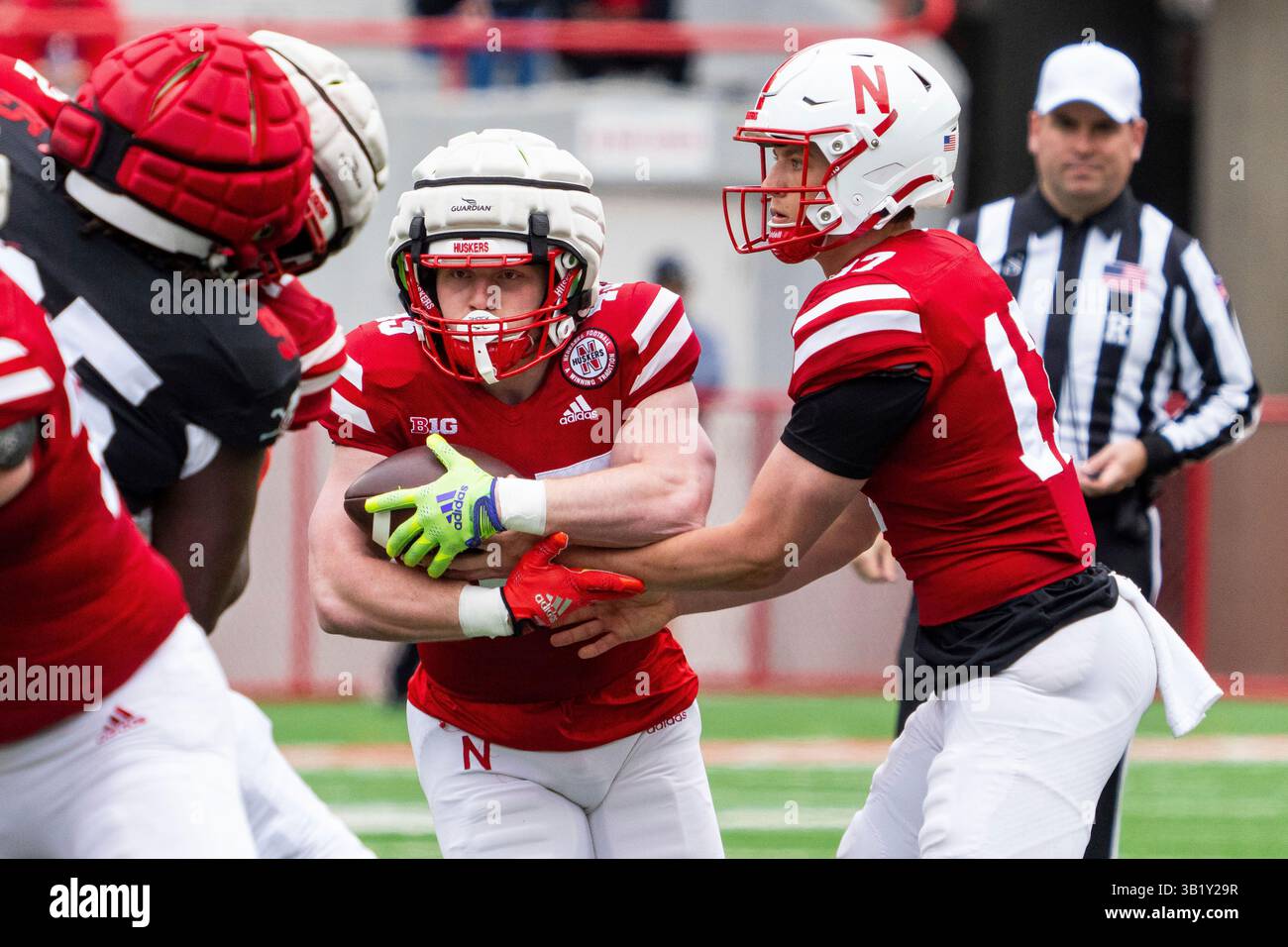 Nebraska quarterback Luke Longval (17) hands off to running back Izaac ...