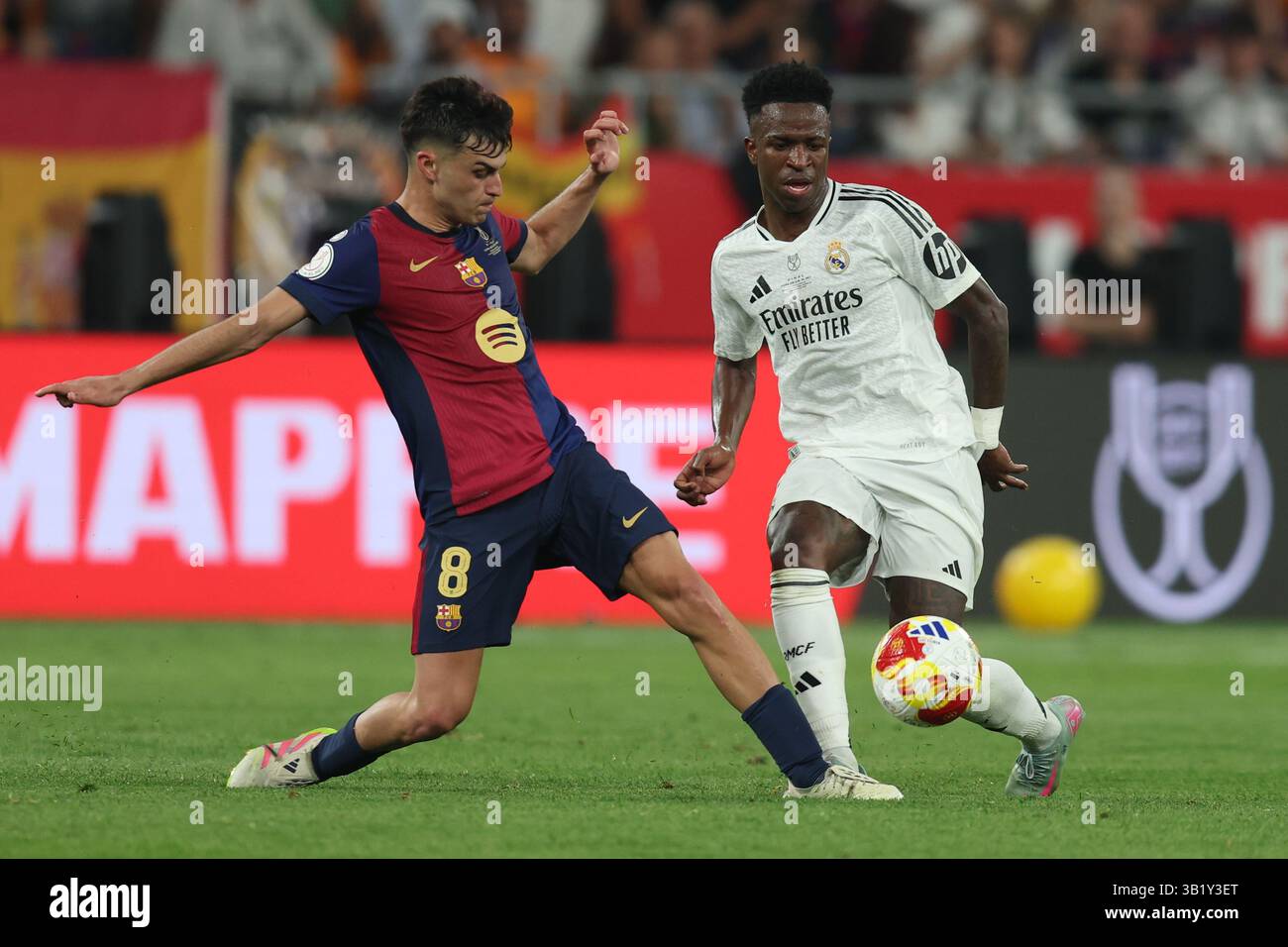 Sevilla, Spain. 26th Apr, 2025. Pedro Gonzalez Pedri of FC Barcelona and Vinicius Junior of Real ...