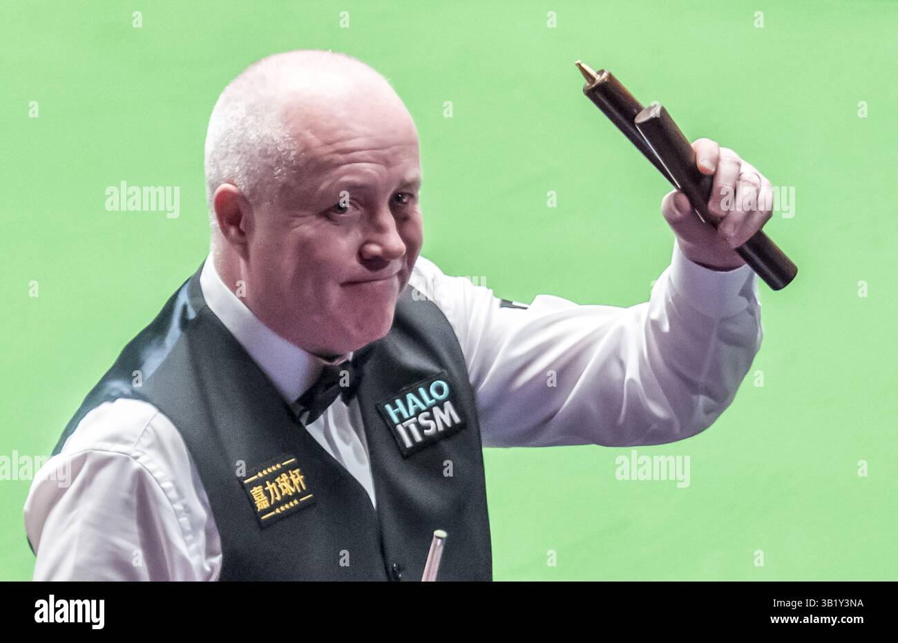 John Higgins celebrates after beating Xiao Guodong during day eight of ...