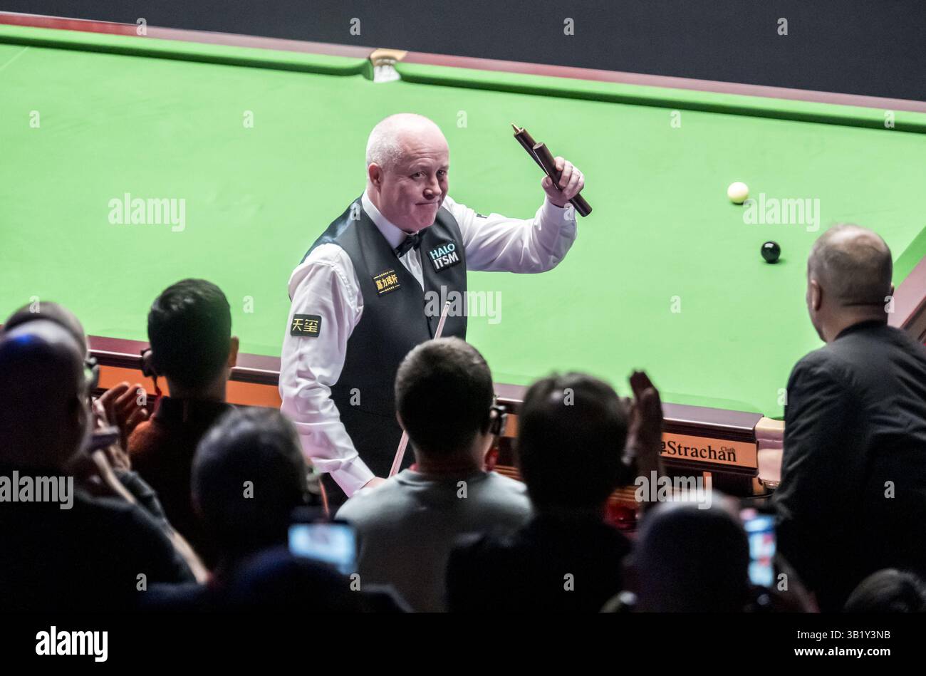John Higgins celebrates after beating Xiao Guodong during day eight of ...