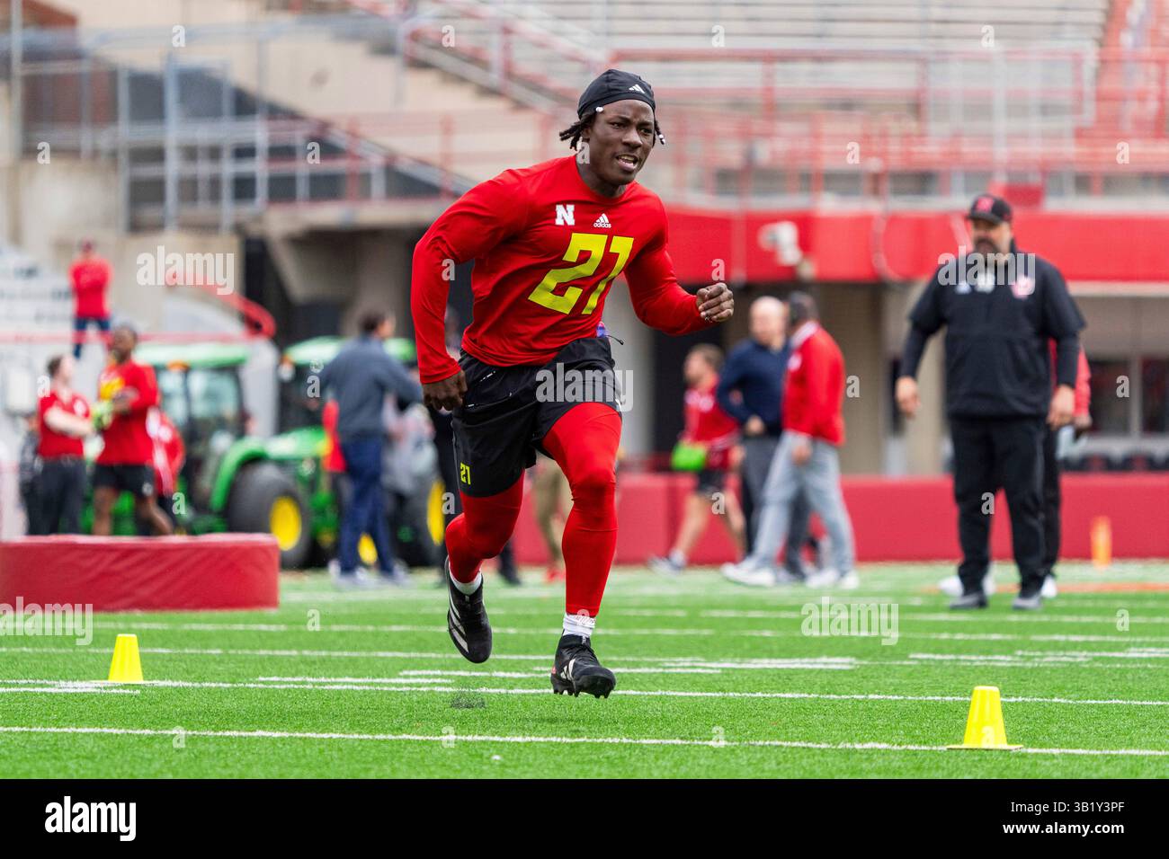 Nebraska running back Emmett Johnson (21) runs during an NCAA college ...